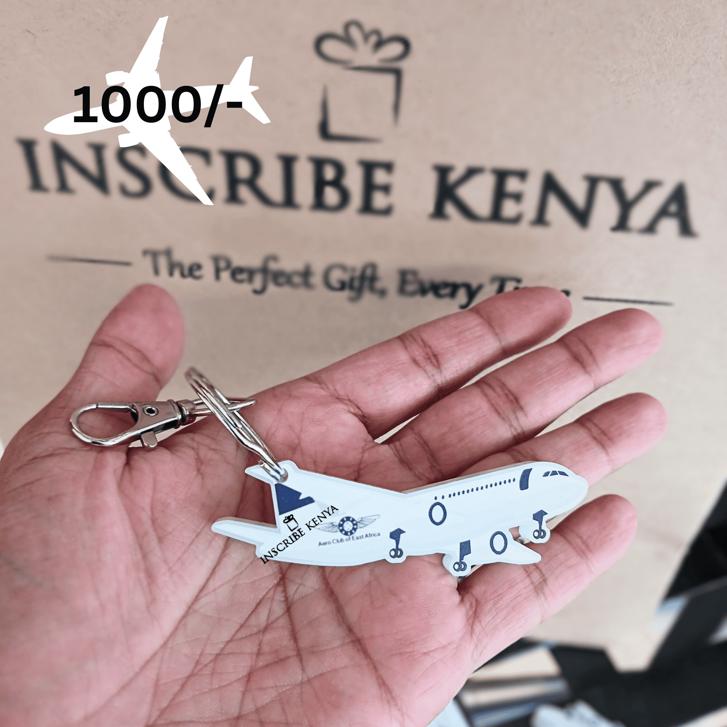Aeroplane shaped keychain. – InscribedGiftsKe